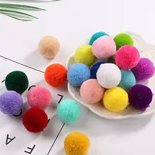 Soft, Fluffy Pom Poms In Various Sizes For Diy Crafts And Home Decor.