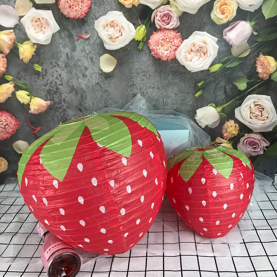 3D Strawberry Lanterns Add A Sweet Touch To Your Party Decorations.