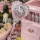 US $ 6 . 9 8