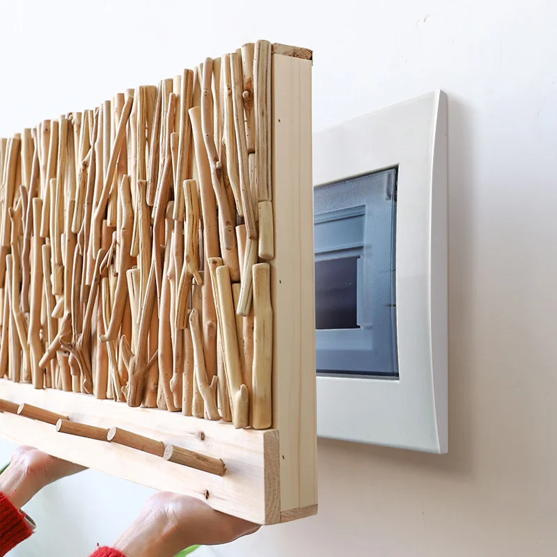 A wooden wall ornament designed to resemble an electric meter box ...