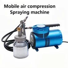 A small air compressor spray gun, designed for use with a pneumatic ...