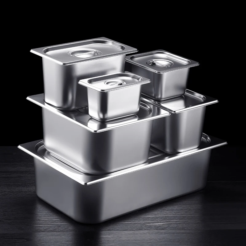 Stack of stainless steel square pots, ideal for kitchen storage or ...